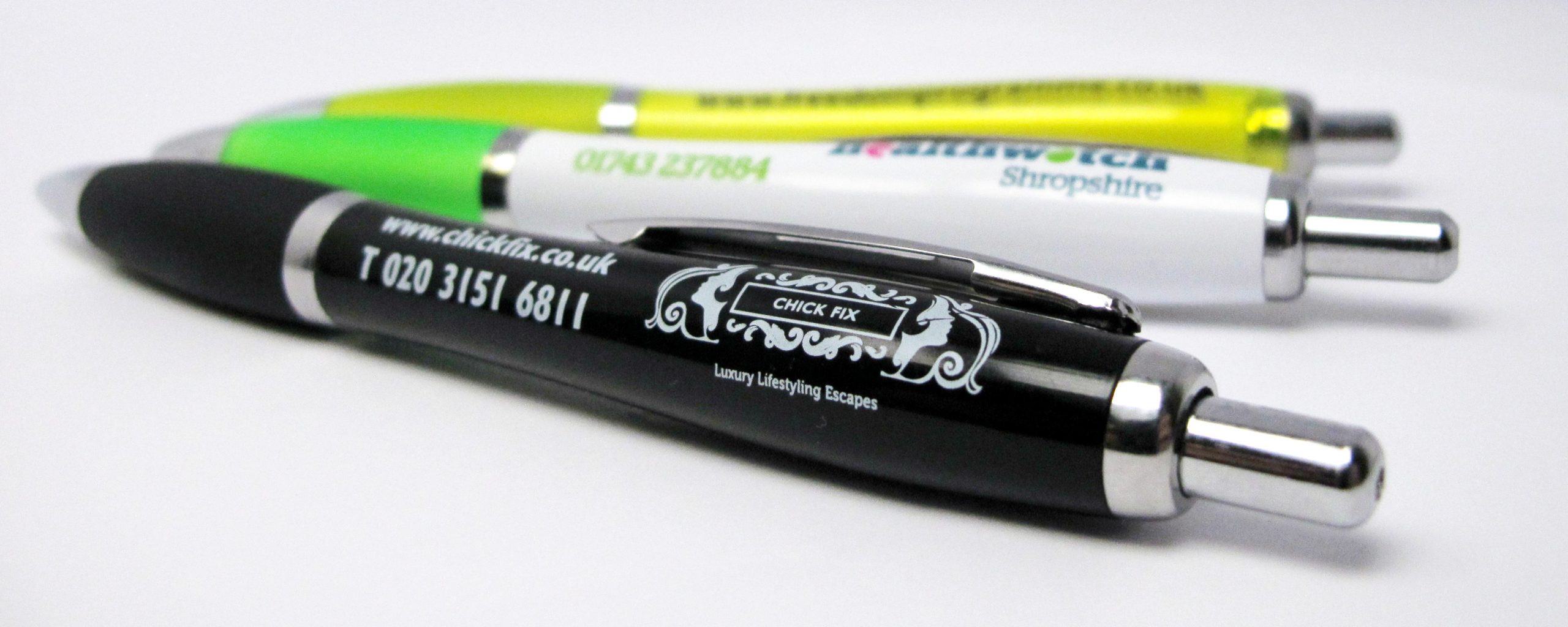 Busy printing Curvy promotional pens - Shropshire Printing